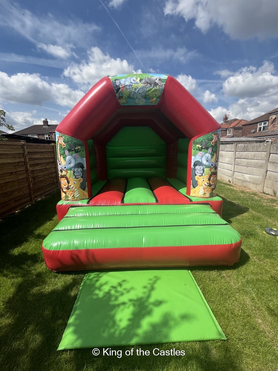 Red & Green Glossy Bouncy Castle Hire in Manchester and the North West